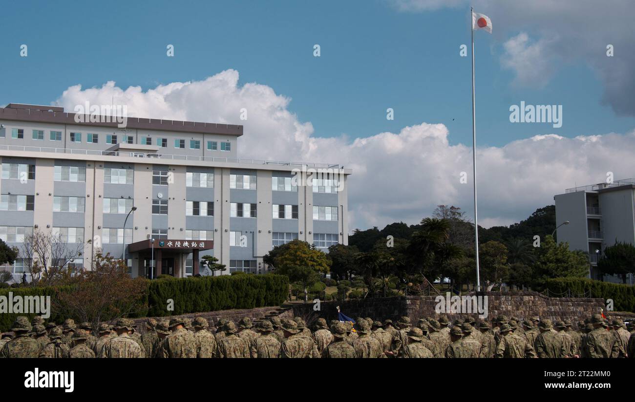 Sasebo, Japan. 16th Oct, 2023. Defense Minister Minoru Kihara gives ...