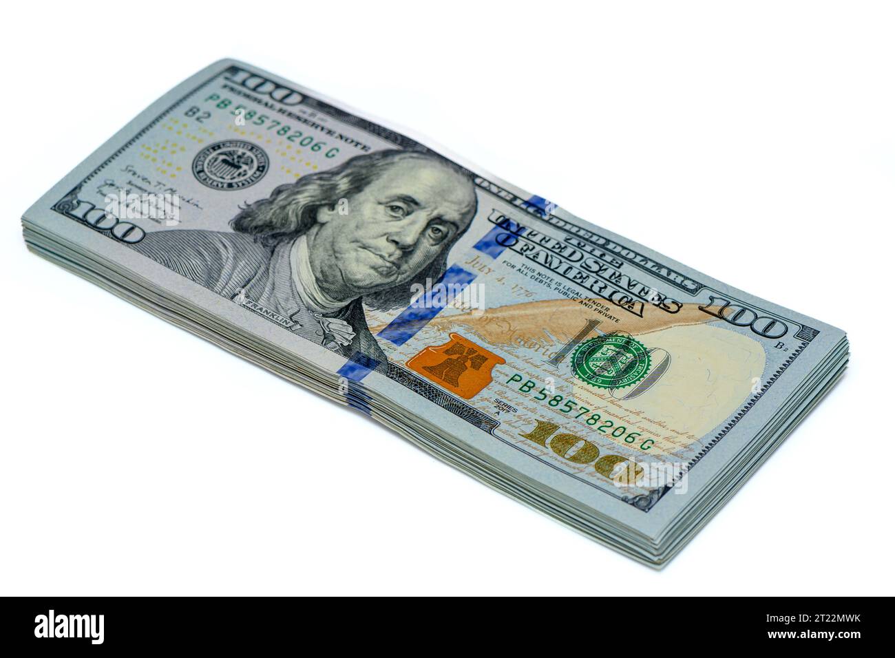 a stack of 100 dollar bills on a white background studio shooting Stock ...