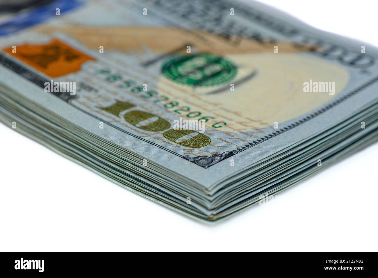a stack of 100 dollar bills on a white background studio shooting 1 ...