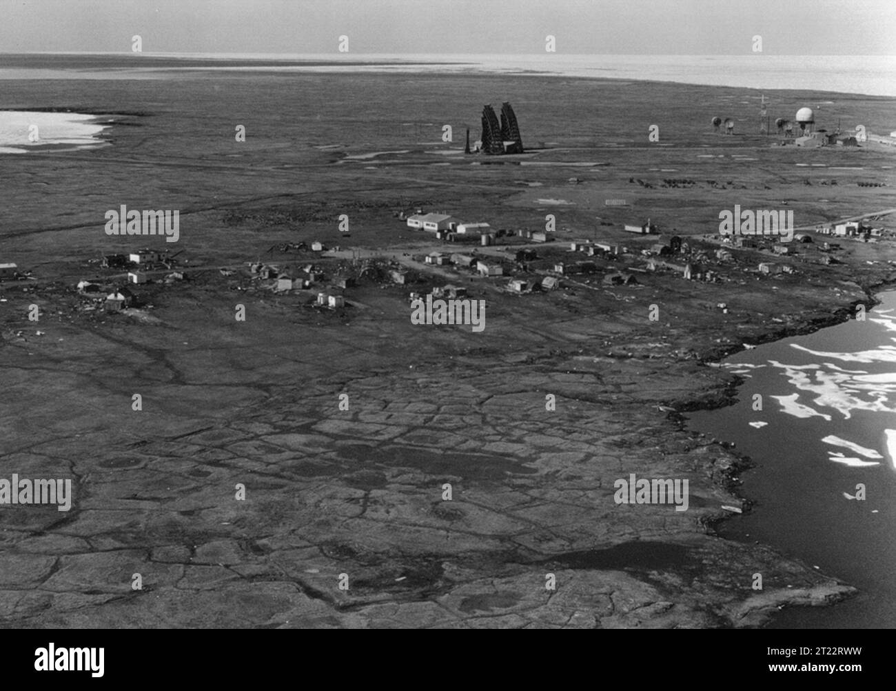 Aerial view of Kaktovik village on Barter Island, showing the White ...