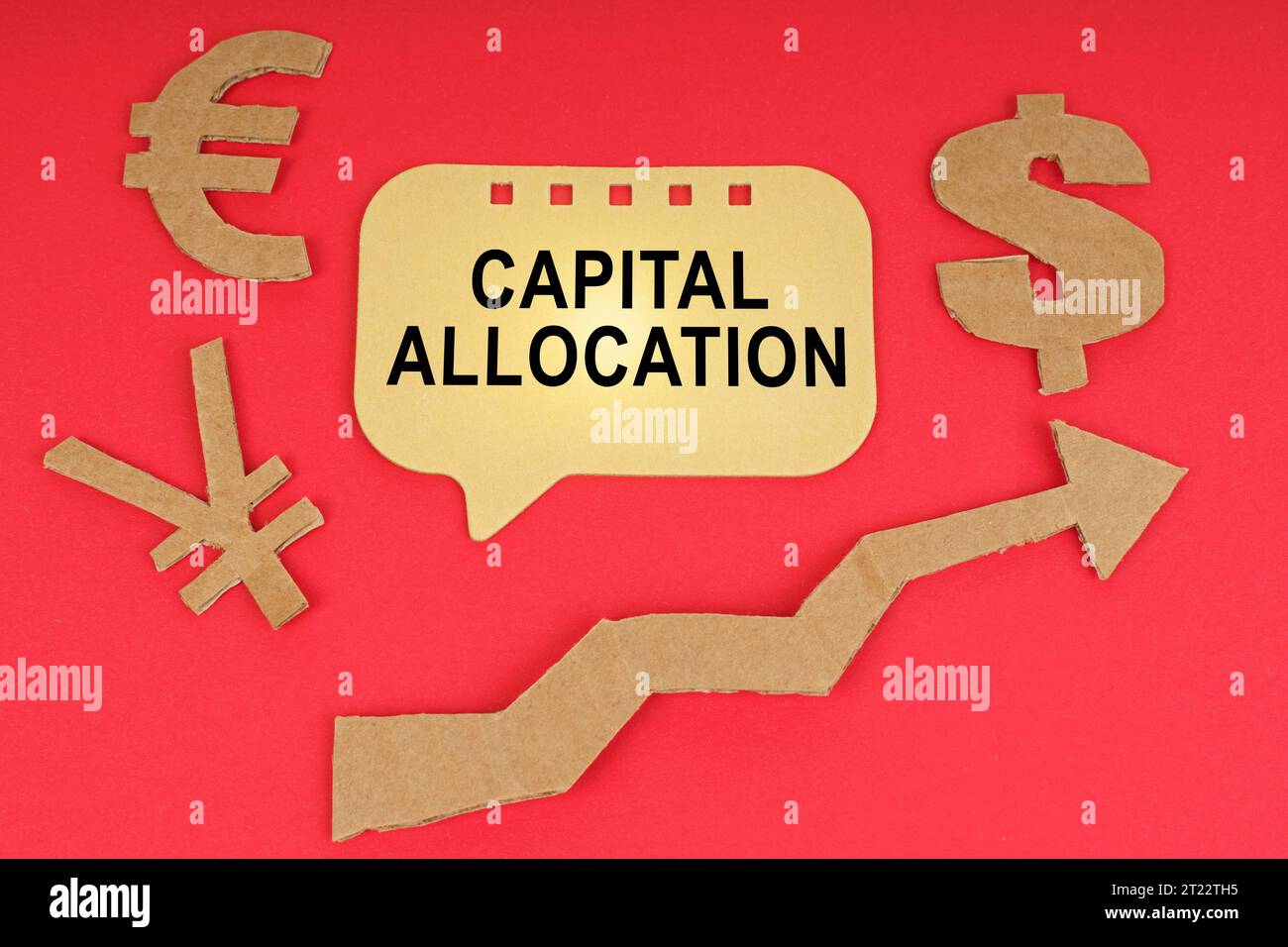 Business concept. On the red surface there are money symbols, an arrow ...