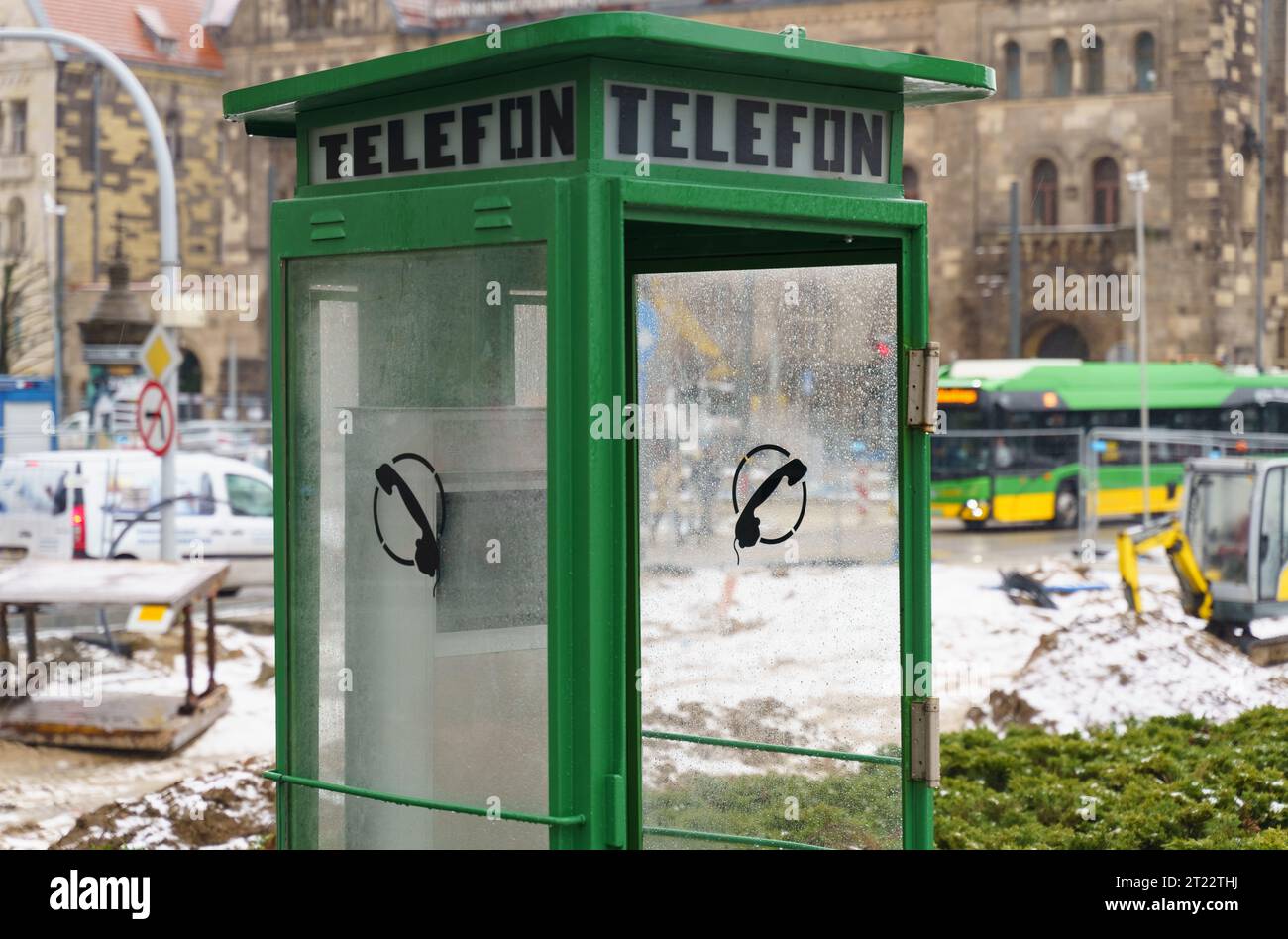 Ruined telephone booth with a broken glass door Stock Photo - Alamy