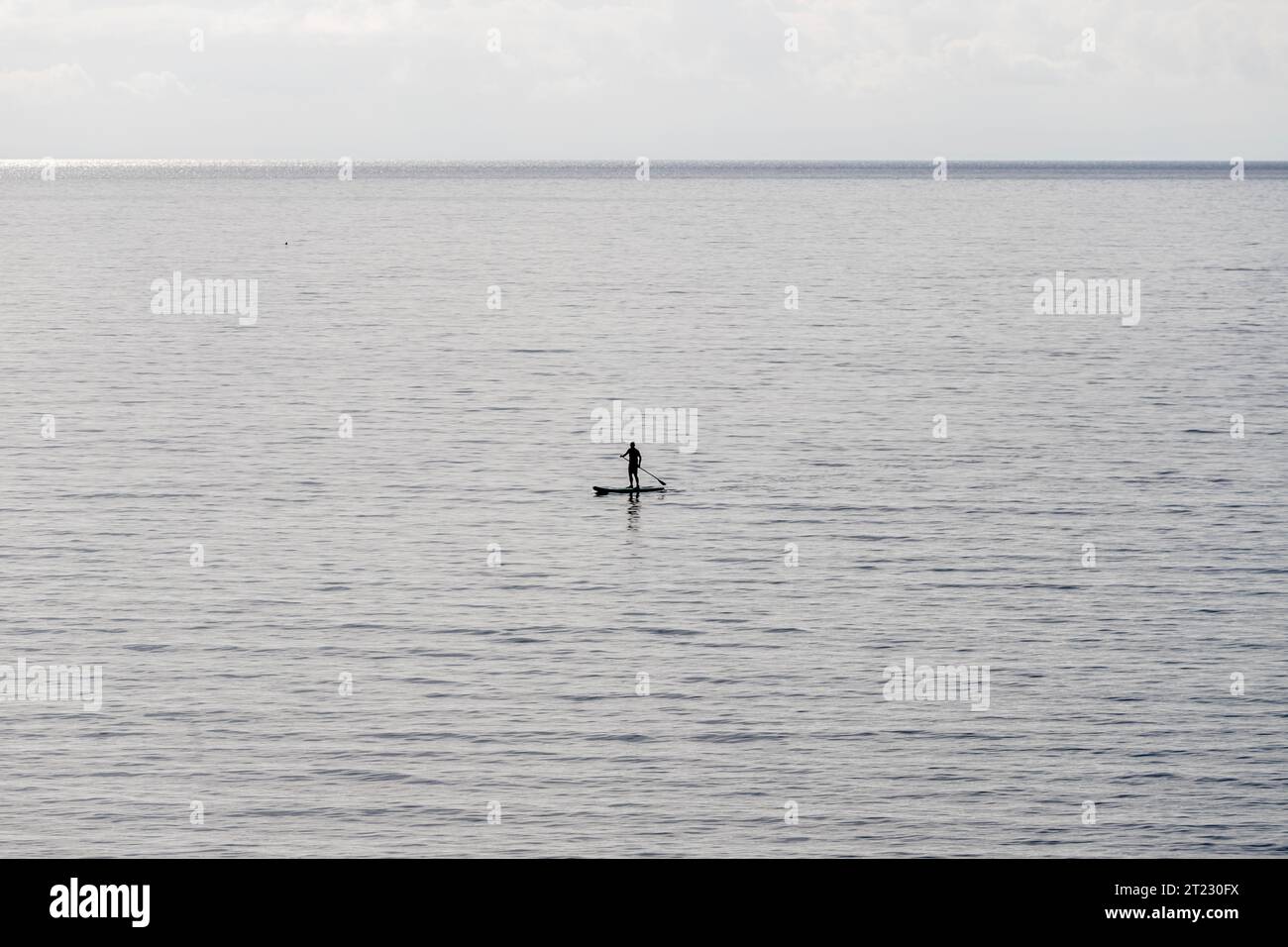 Woman water paddling Isle Of Arran, Firth of Clyde, Scotland, UK Stock ...