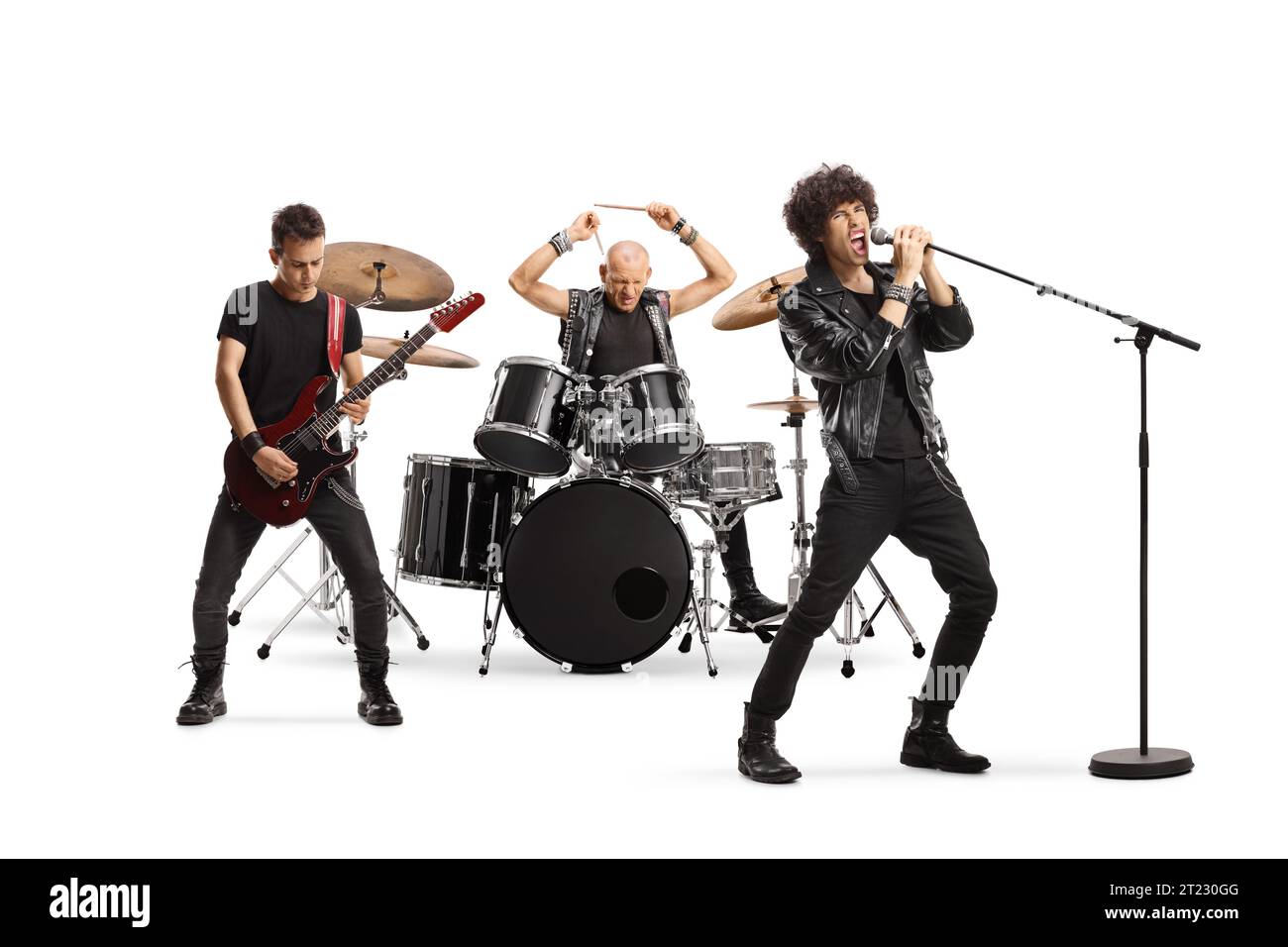 Male music band performing with a guitarist, drummer and a singer ...