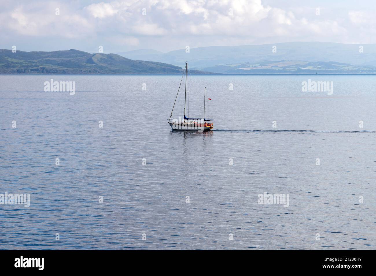 Sailing boat in Corrie, Isle Of Arran, Firth of Clyde, Scotland, UK ...