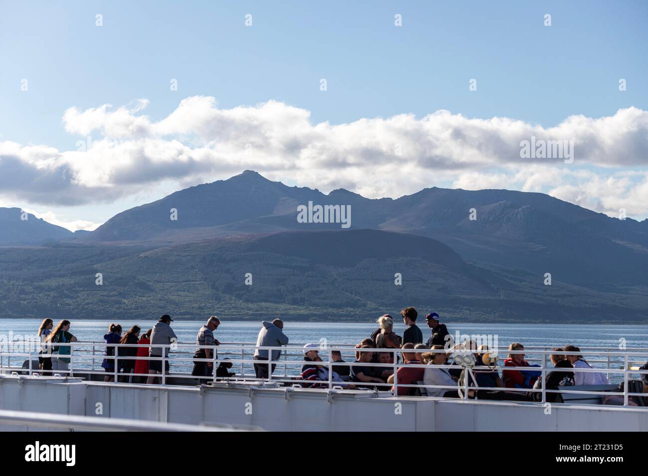 Passengers in open deck, MV Alfred, Pentland Ferries, from Brodick to ...