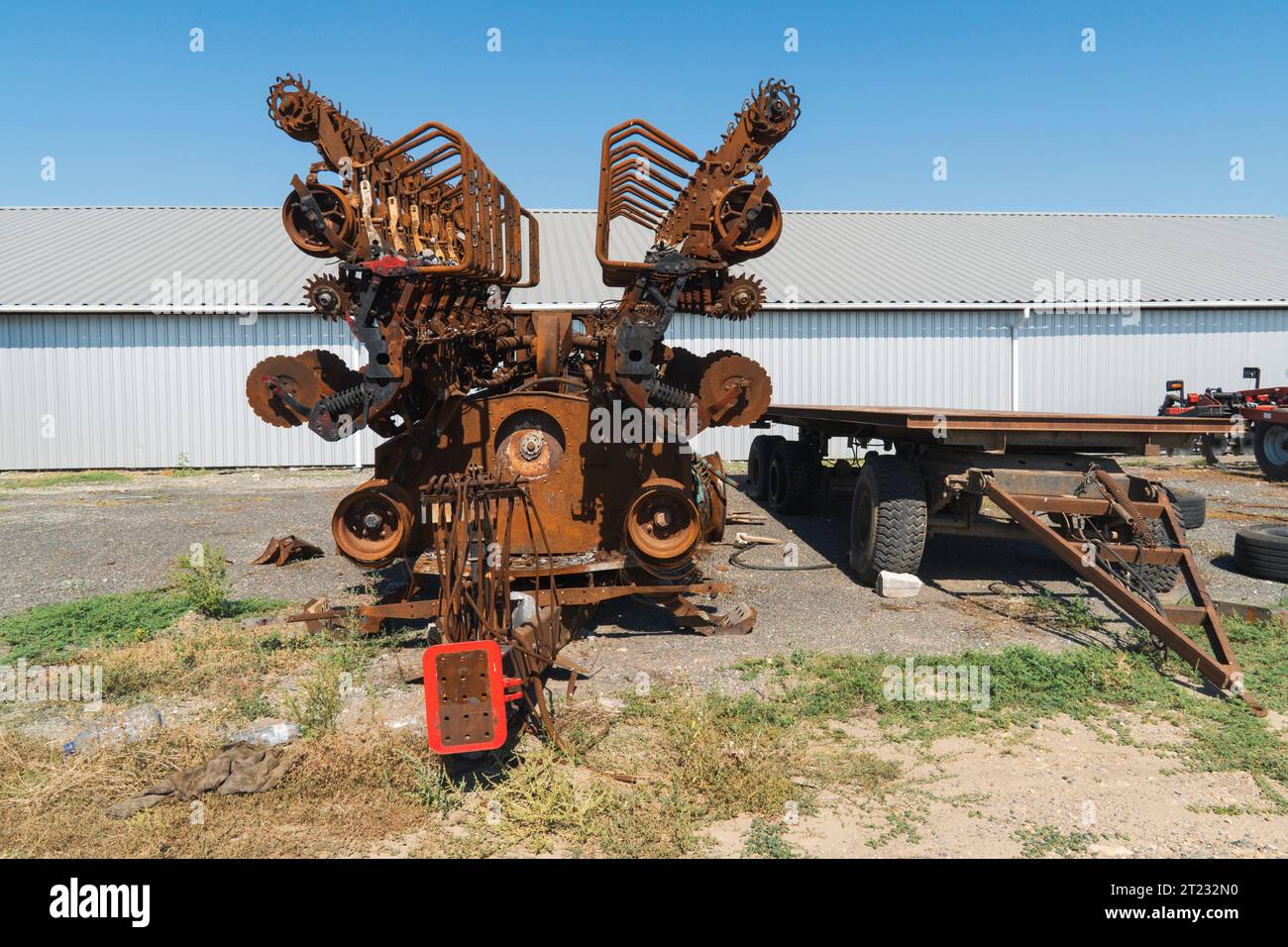 Damaged agricultural equipment destroyed by artillery fire. War in ...