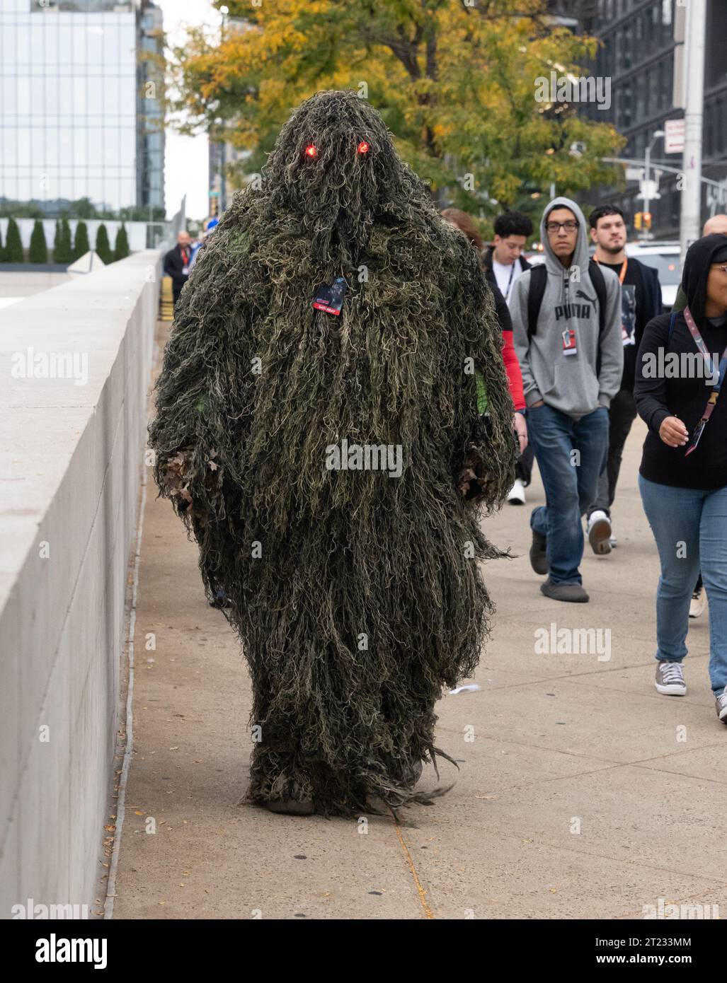 New York, New York, USA. 14th Oct, 2023. A person dressed as SWAMP MAN ...