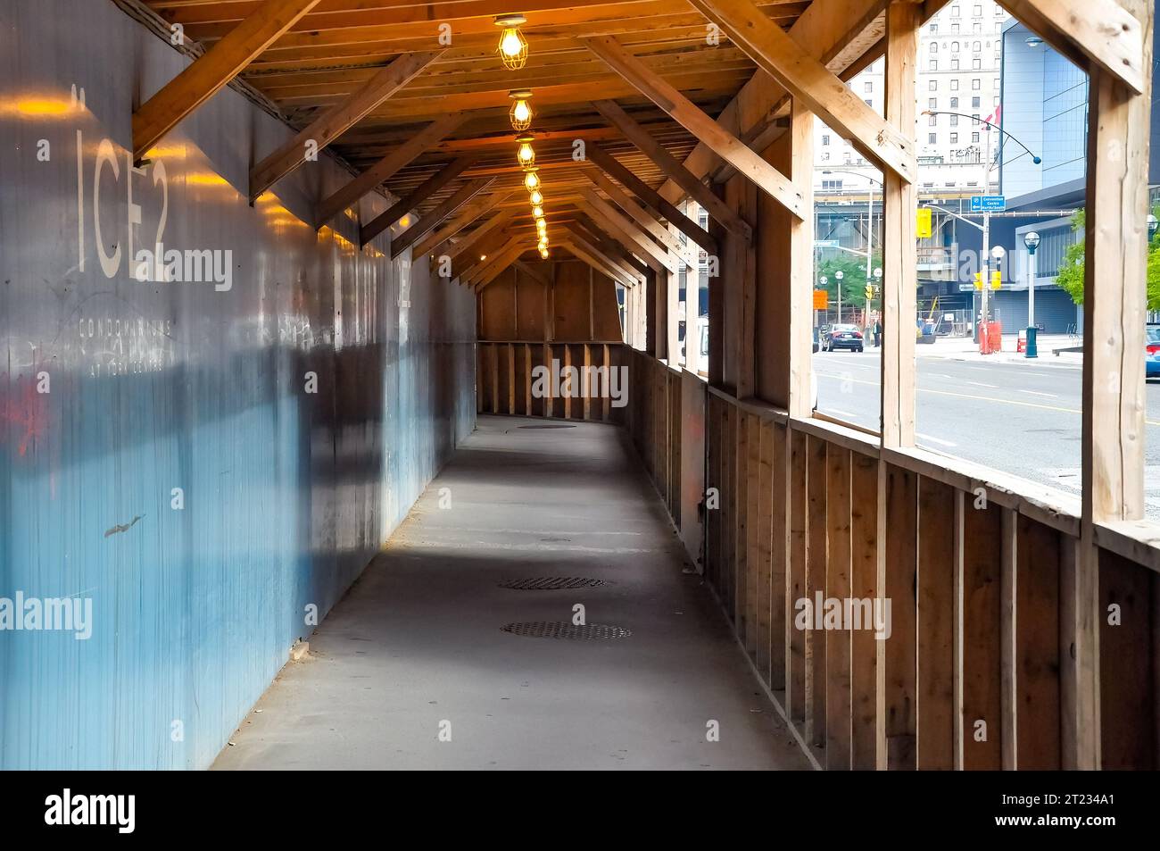 Wood tunnel for pedestrian in construction site in the downtown ...