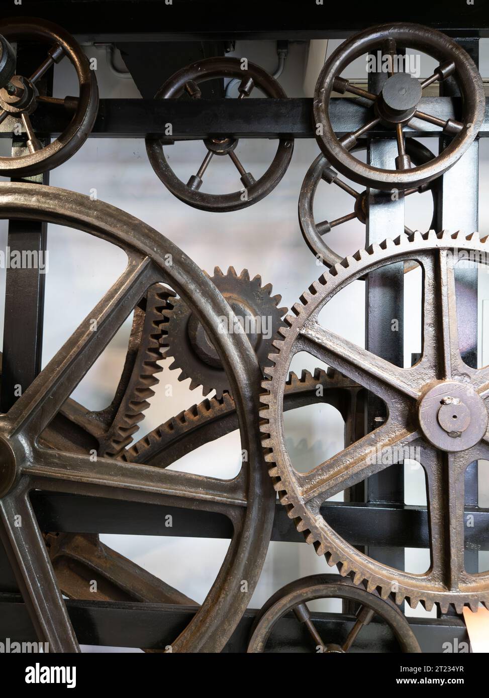 Antique iron wheel gear system Stock Photo - Alamy