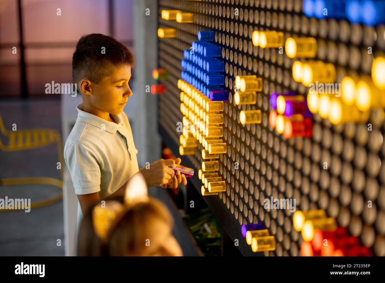 Kids playing in science museum Stock Photo - Alamy