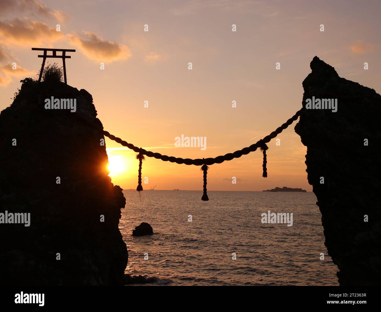 Sunset and Japanese Shinto Shrine On the ocean Stock Photo - Alamy
