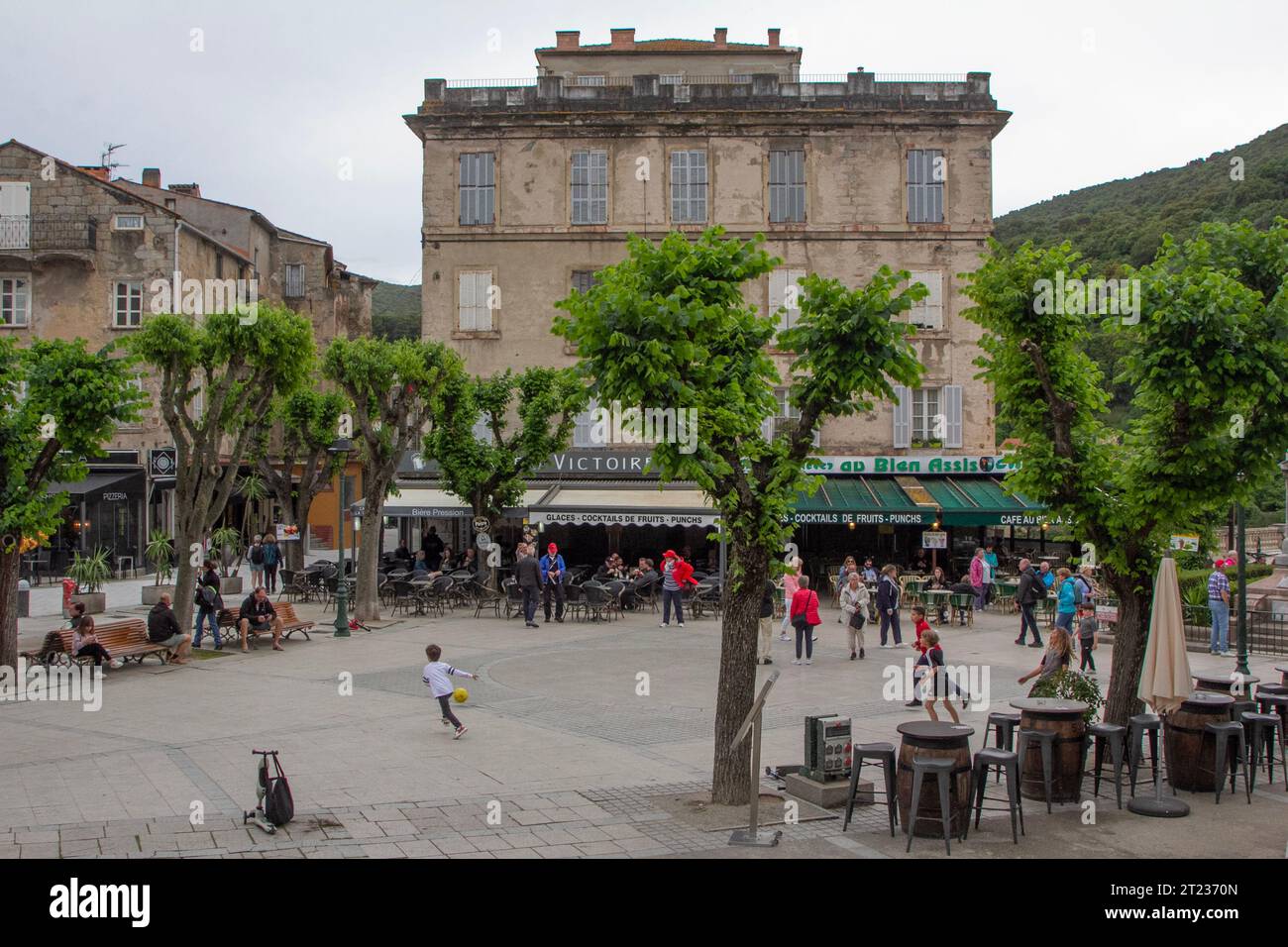 Sartène, Corsica, in spring when children come out to play football and ...
