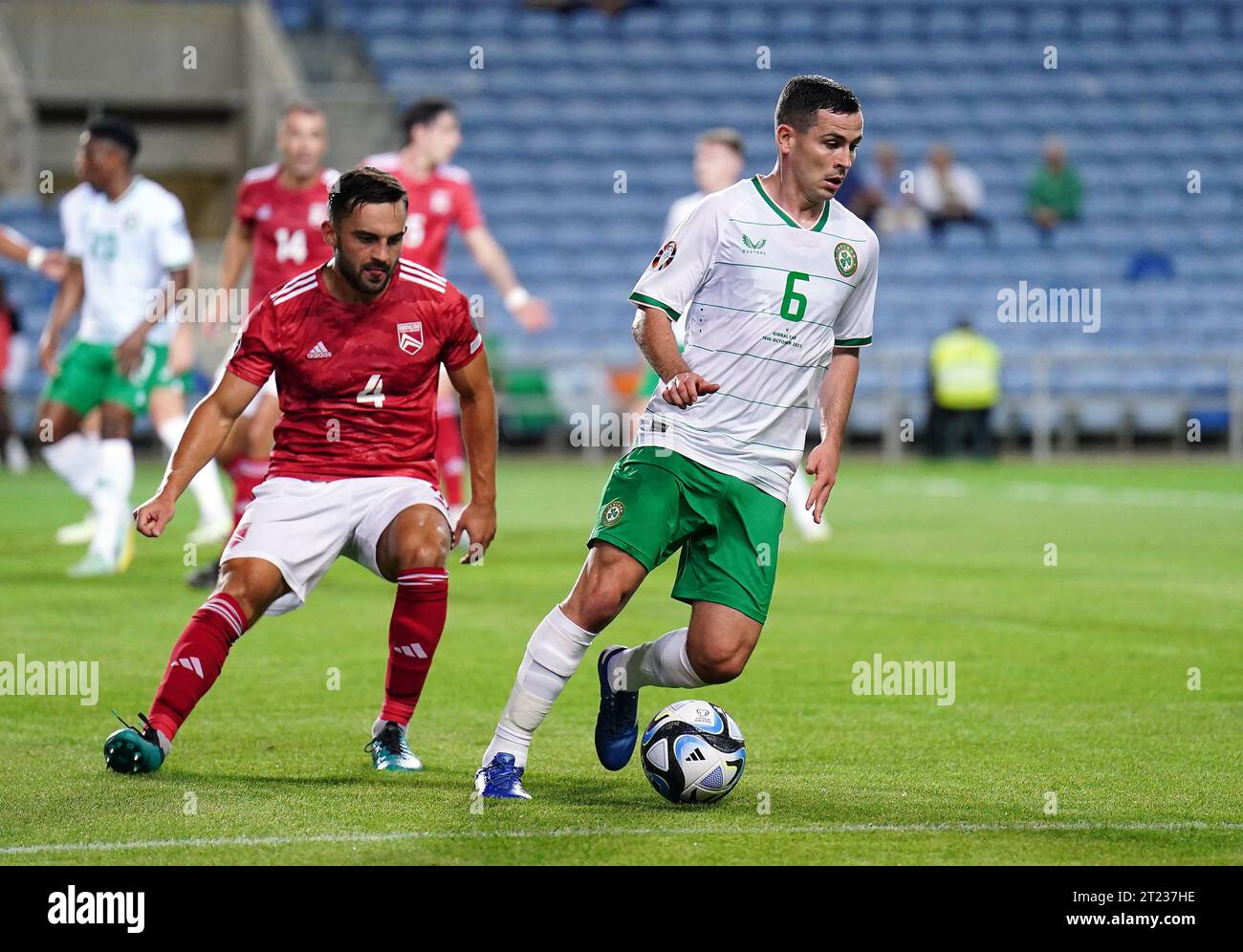 Gibraltar’s Jack Sergeant and Republic of Ireland’s Josh Cullen (right ...