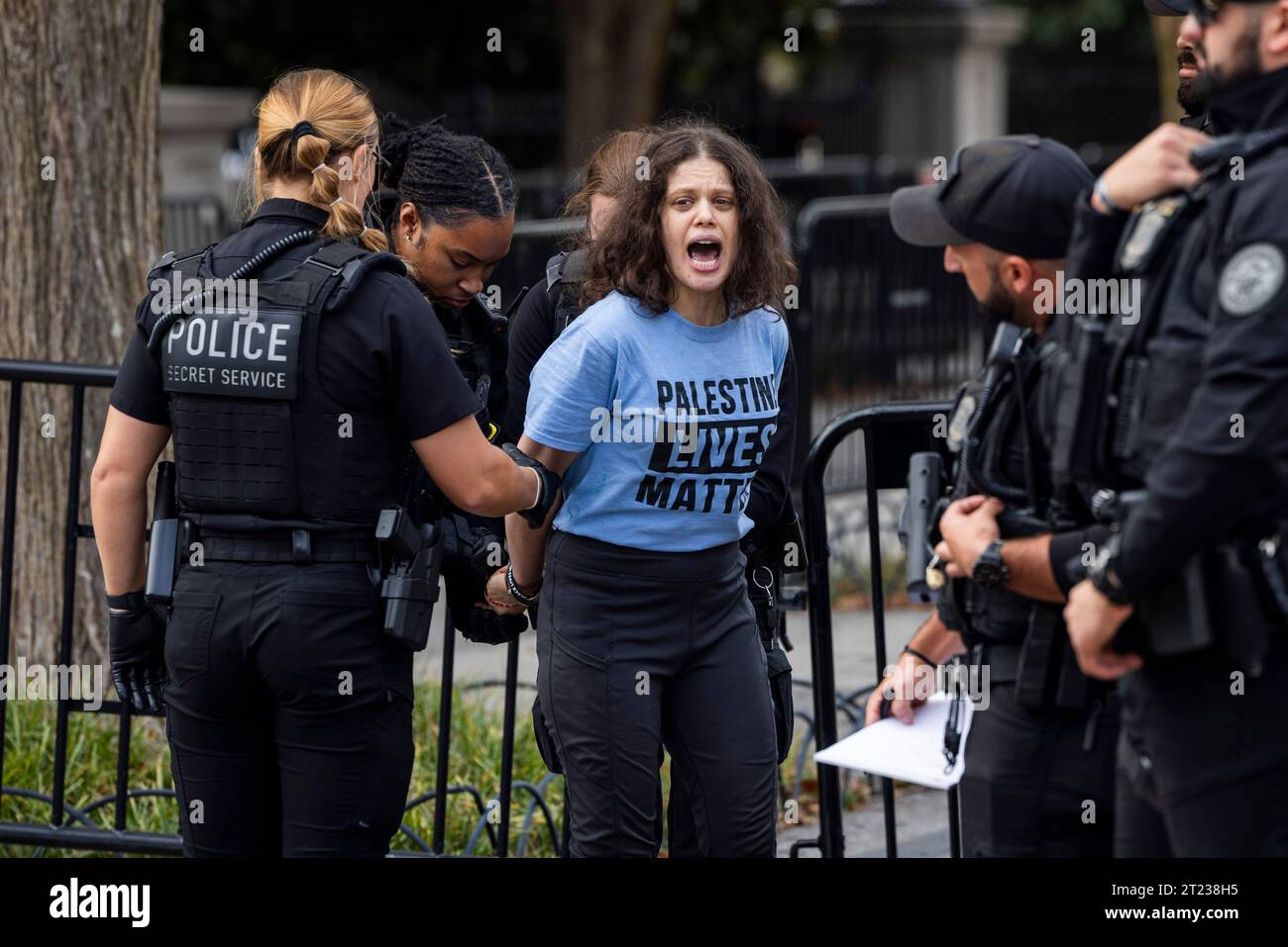 Protestors against IsraelÕs planned incursion into Gaza are handcuffed ...