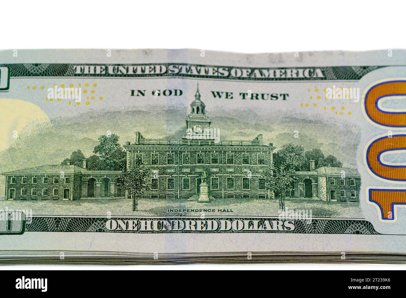 a stack of 100 dollar bills on a white background studio shooting 9 ...