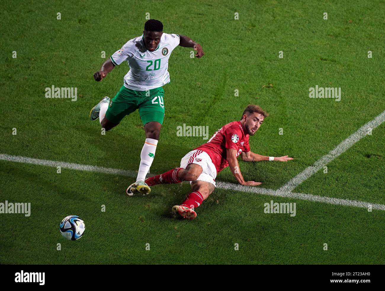 Republic of Ireland’s Chiedozie Ogbene is tackled by Gibraltar’s Ethan ...