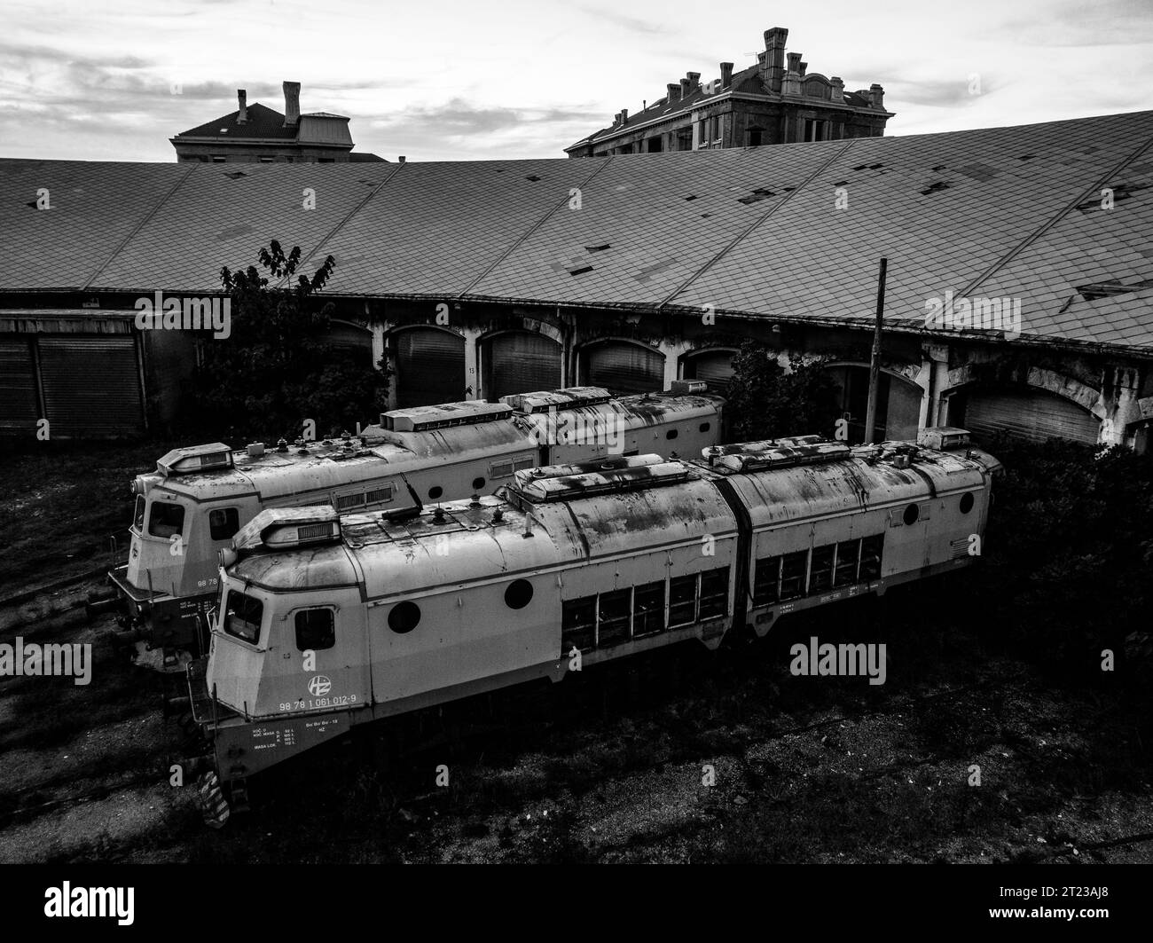 Two old diesel engines on a turntable in Rijeka industrial street ...