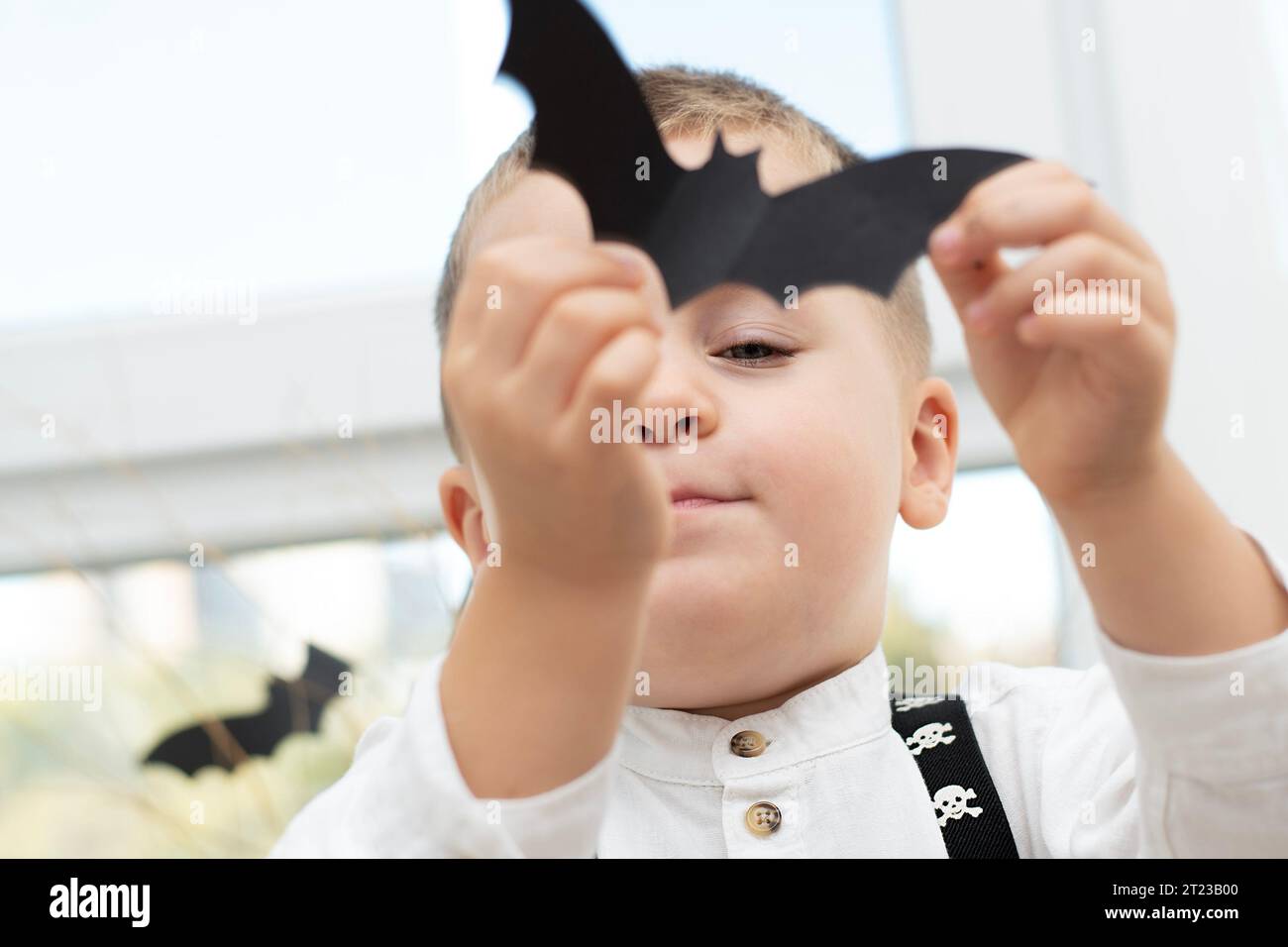 Funny boy paper bat hi-res stock photography and images - Alamy