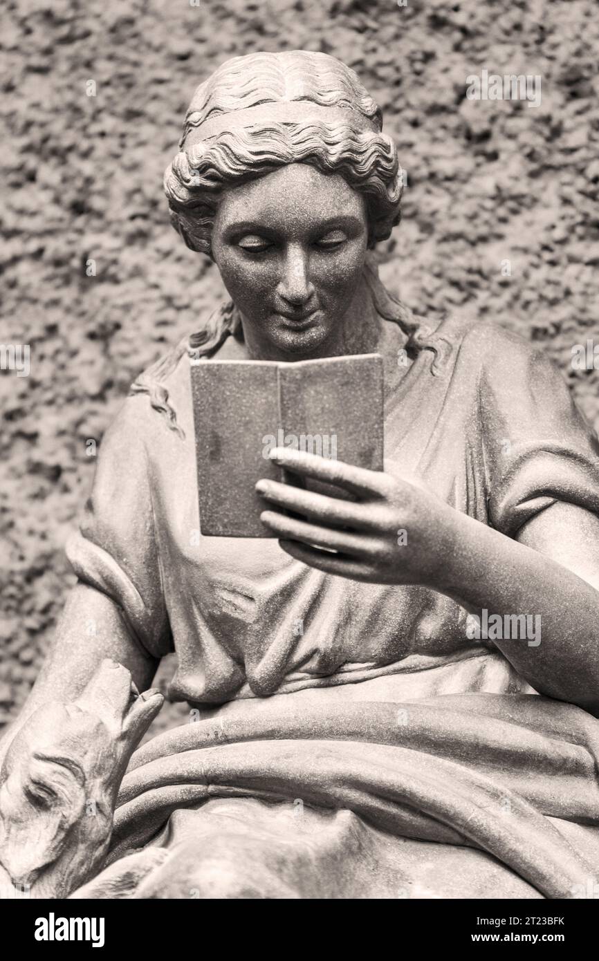 A reproduction of the statue Woman Reading with Dog is at Antler Hill ...