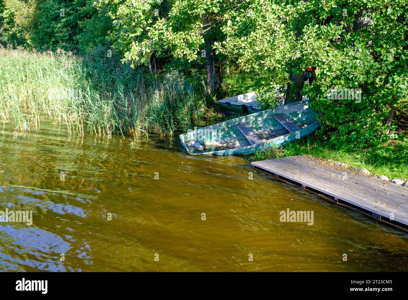 Overturned wooden boat on hi-res stock photography and images - Alamy