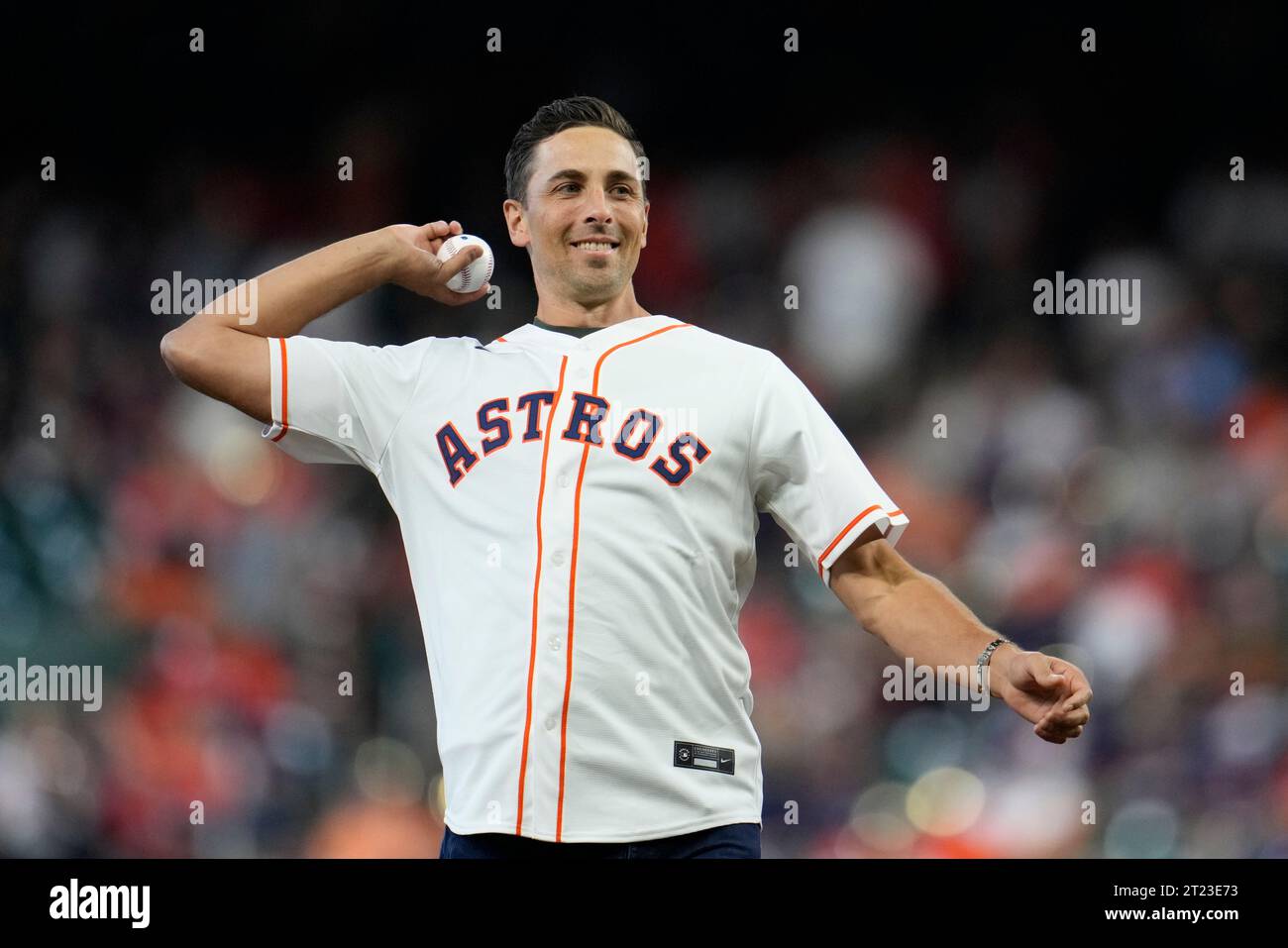 Jason Castro thropws the ceremonial first pitch before Game 2 of the ...