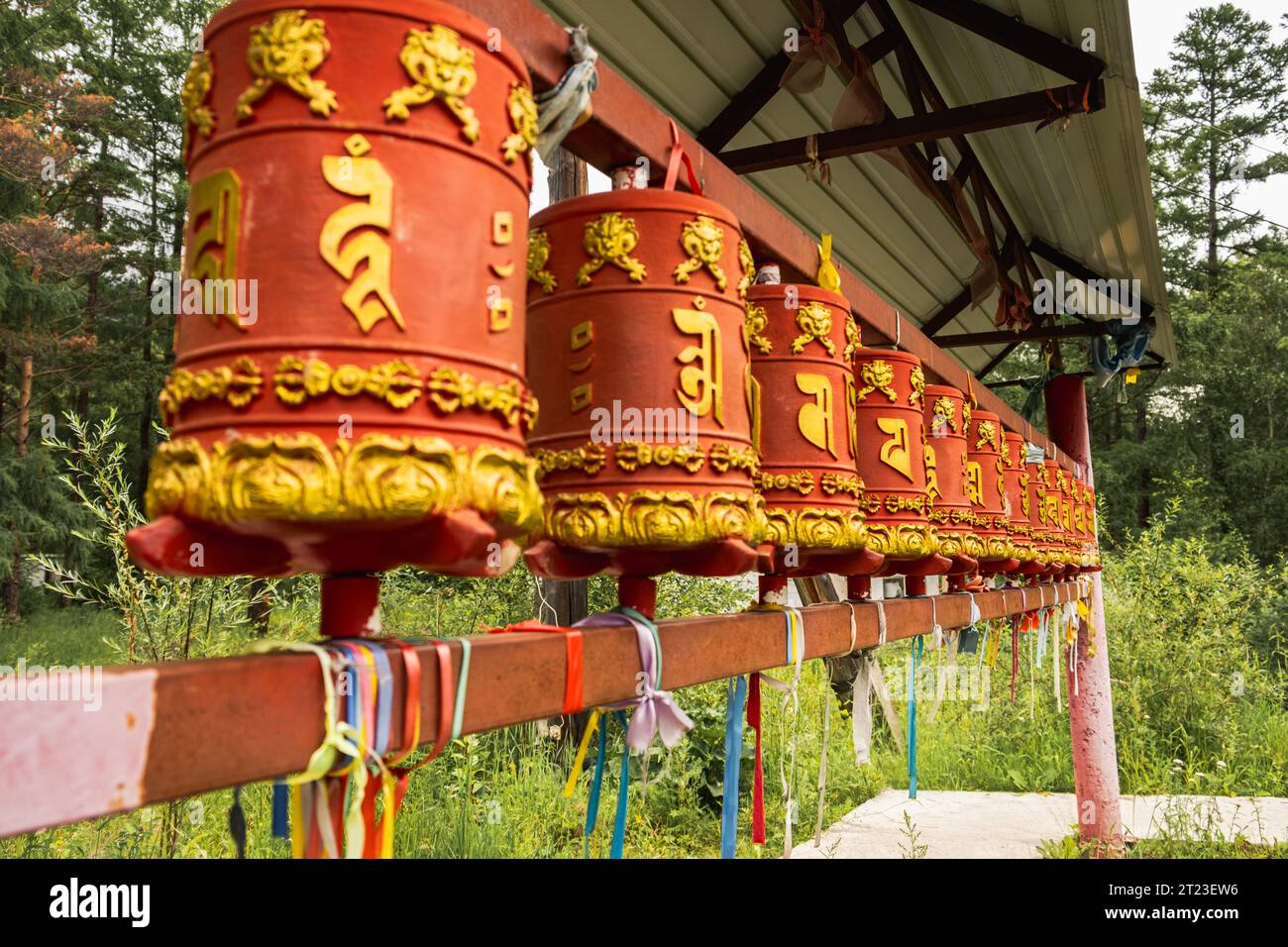 Rotating religious elements for touching turning spinning Buddhist ...