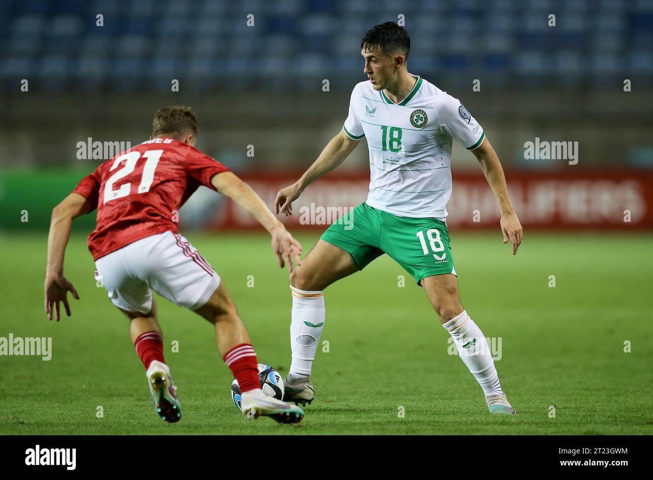 Ireland's Jamie McGrath controls the ball next to Gibraltar's Jamie ...