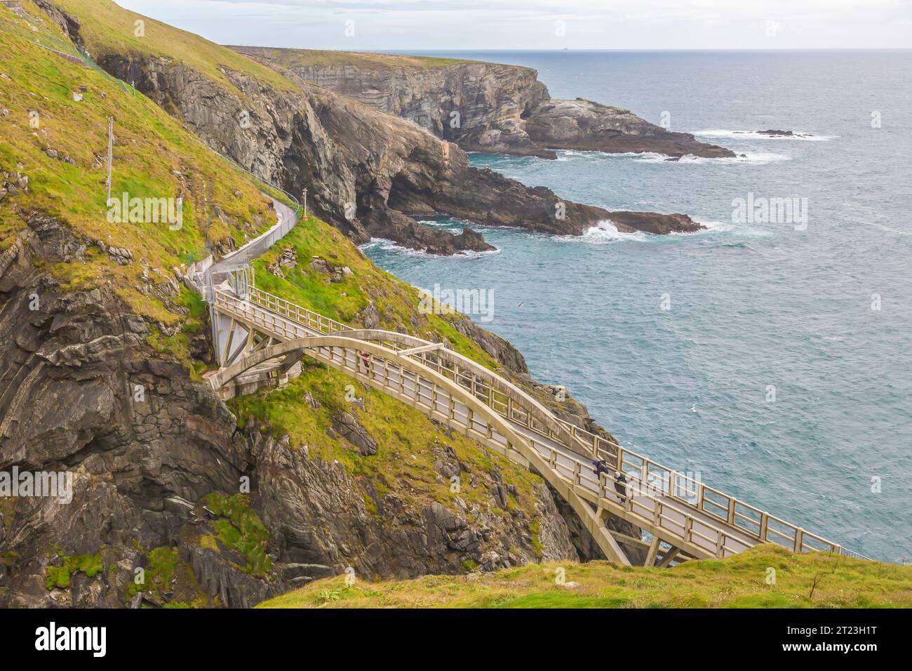 Pedastrian bridge to Mizen Head lighthouse in southern west Ireland ...