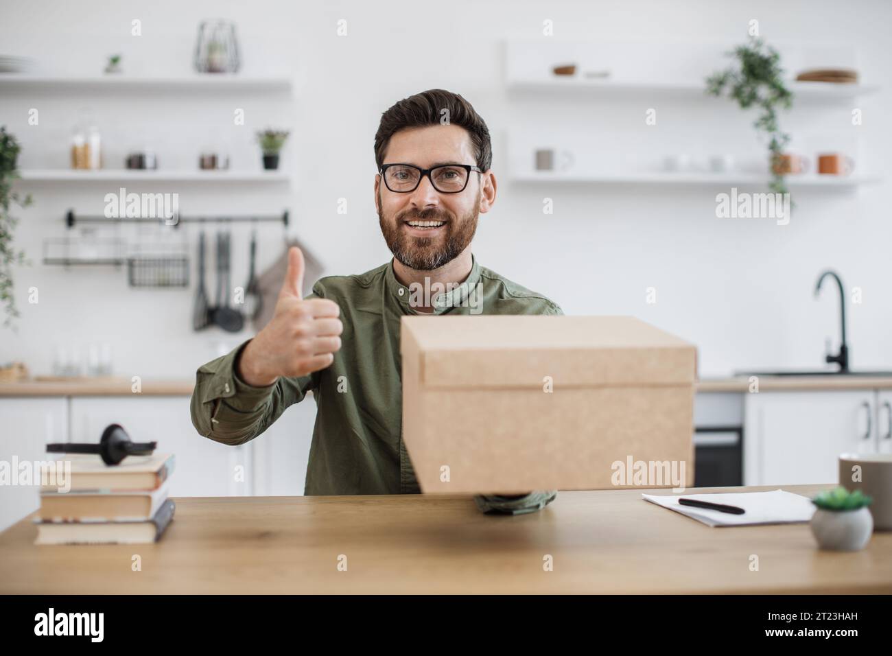Smiling vlogger showing thumb hi-res stock photography and images - Alamy