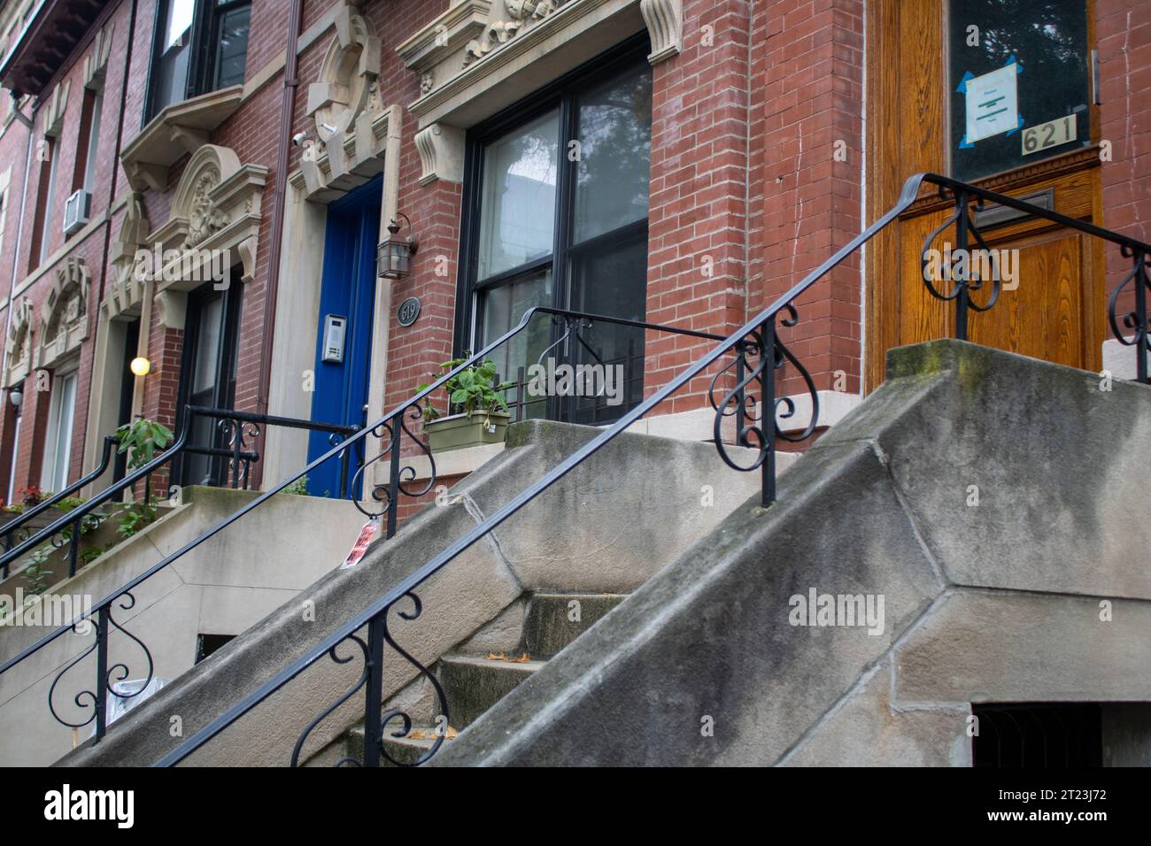 Aerial view of a brick building with a set of stairs leading up to the ...