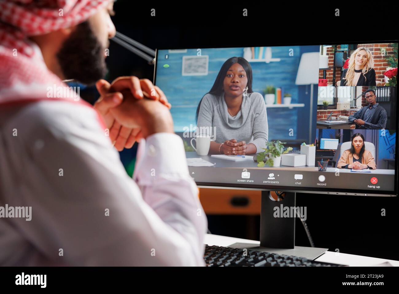 Image shows the computer screen displaying an online meeting between ...