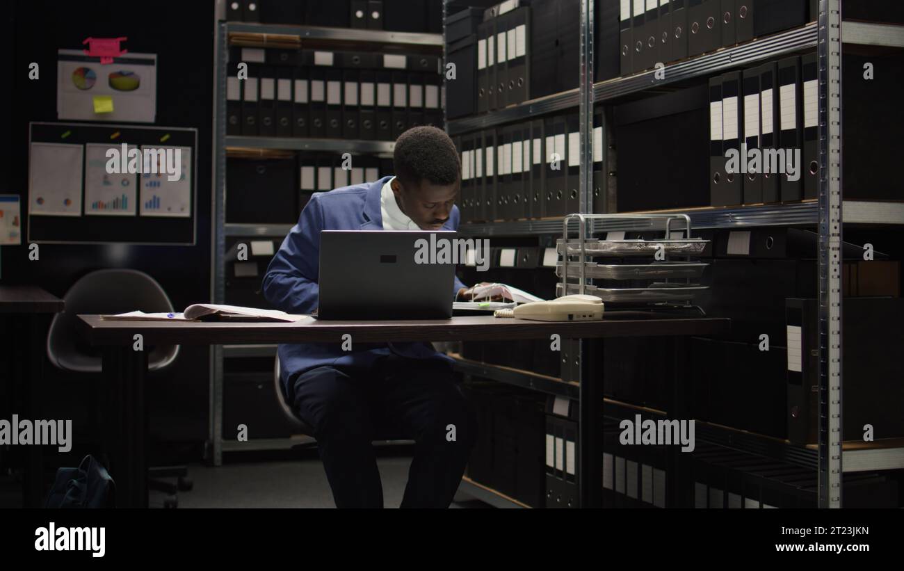 African american private investigator conducting a discreet ...