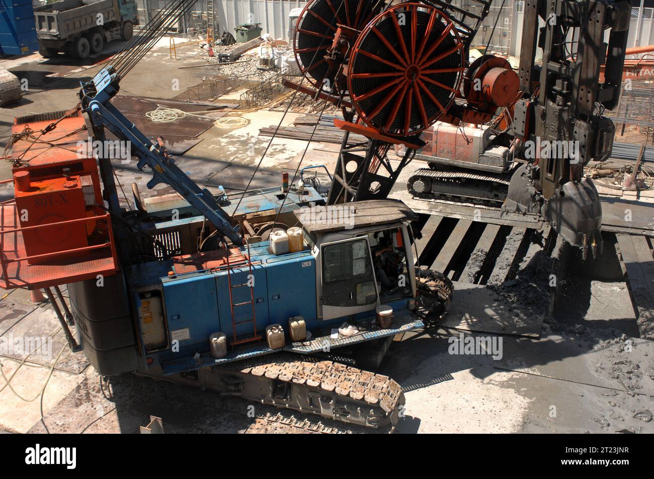 Digger working in a building site during construction of a new office ...