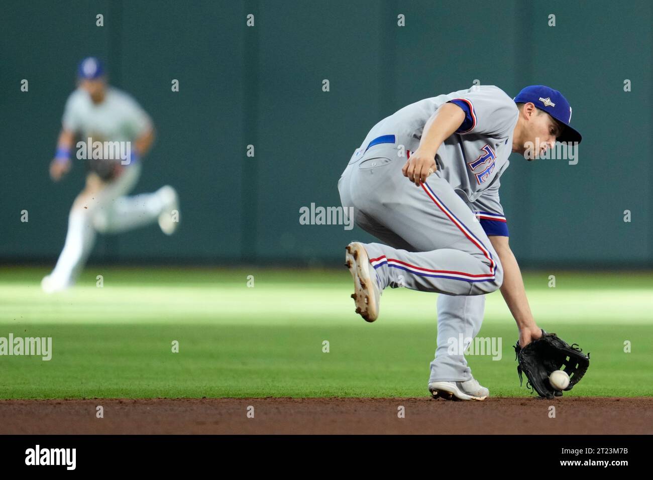Texas Rangers' Corey Seager fields a ground ball hit by Houston Astros ...
