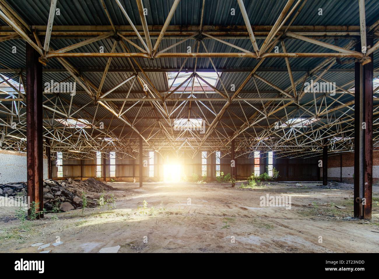 Old ruined industrial building overgrown by green moss and plants Stock ...