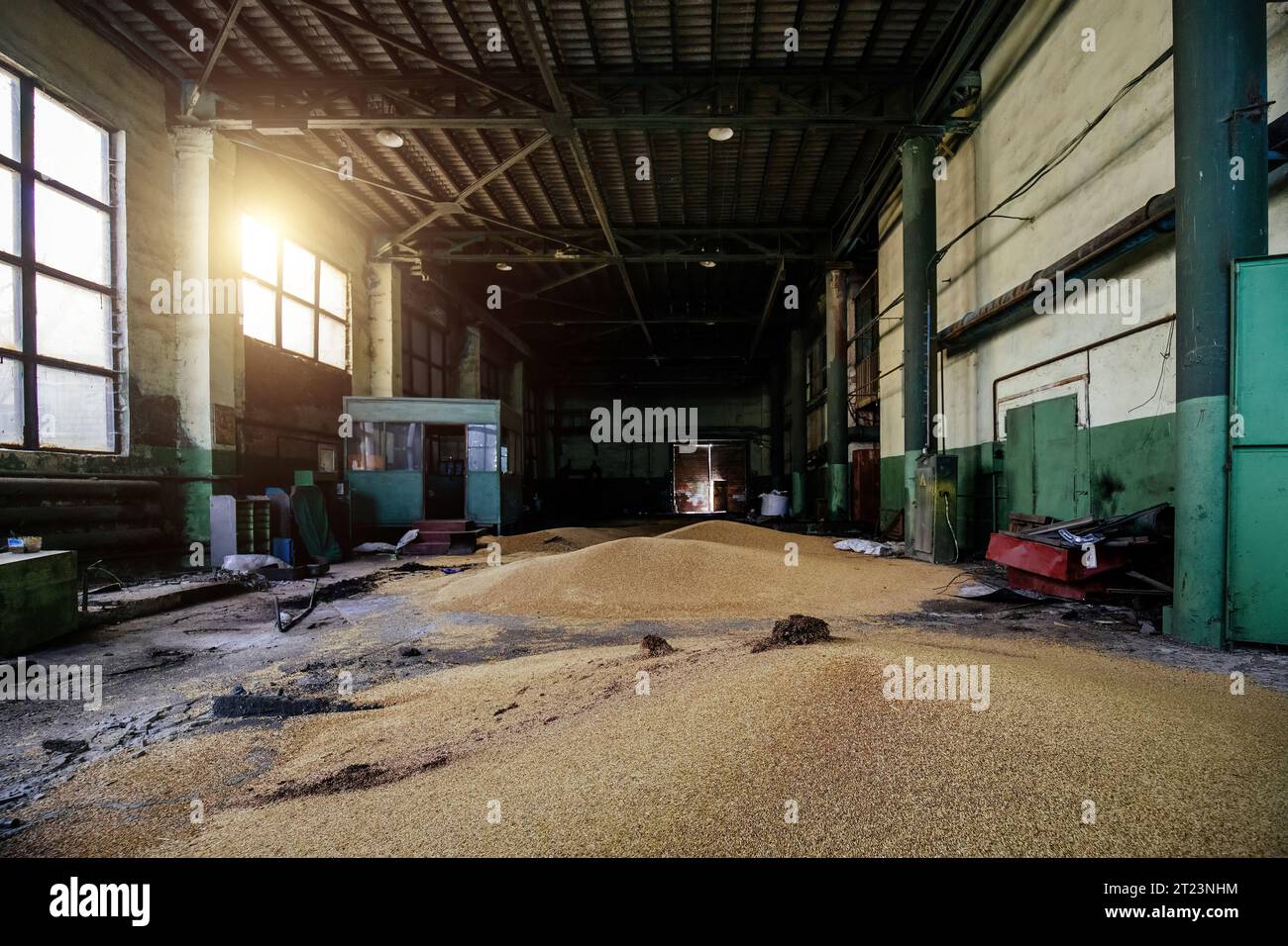Old wheat grain storage in the hangar Stock Photo - Alamy