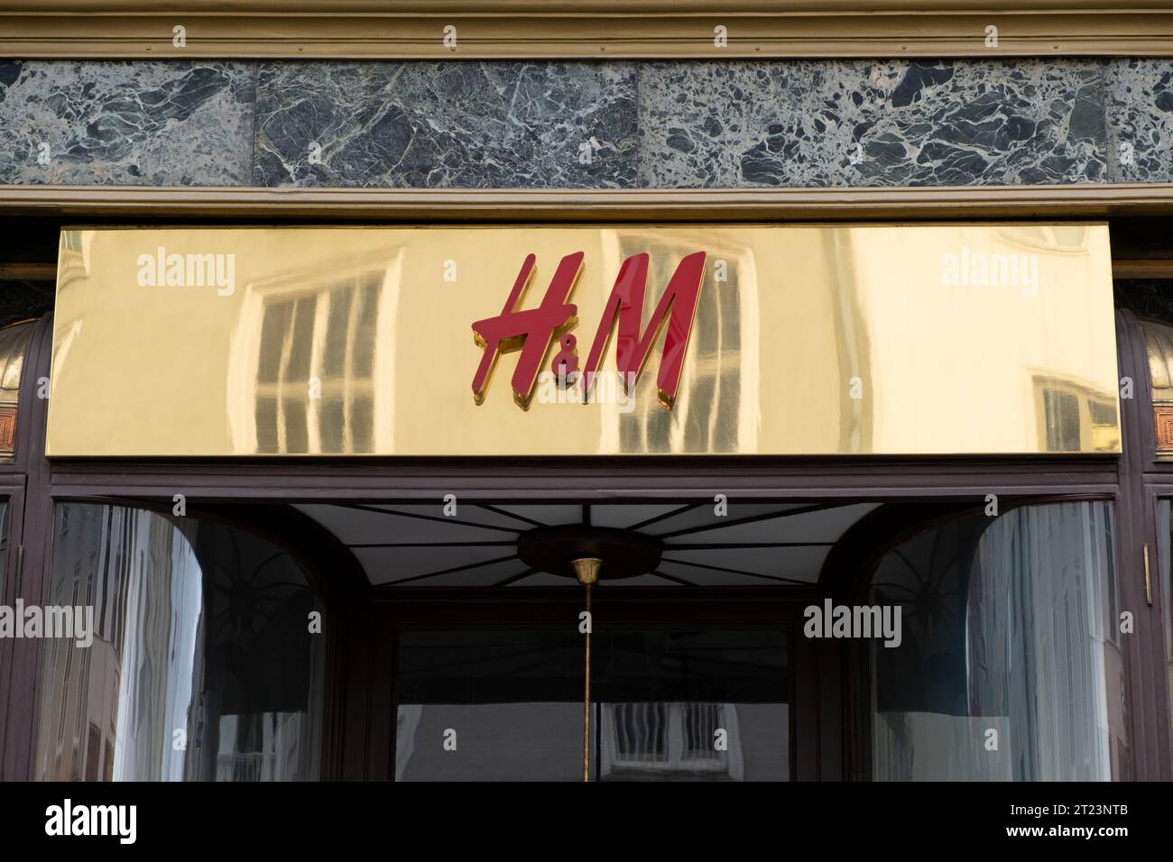 Vienna, Austria - 15 October 2023: H&M sign golden color board on a ...