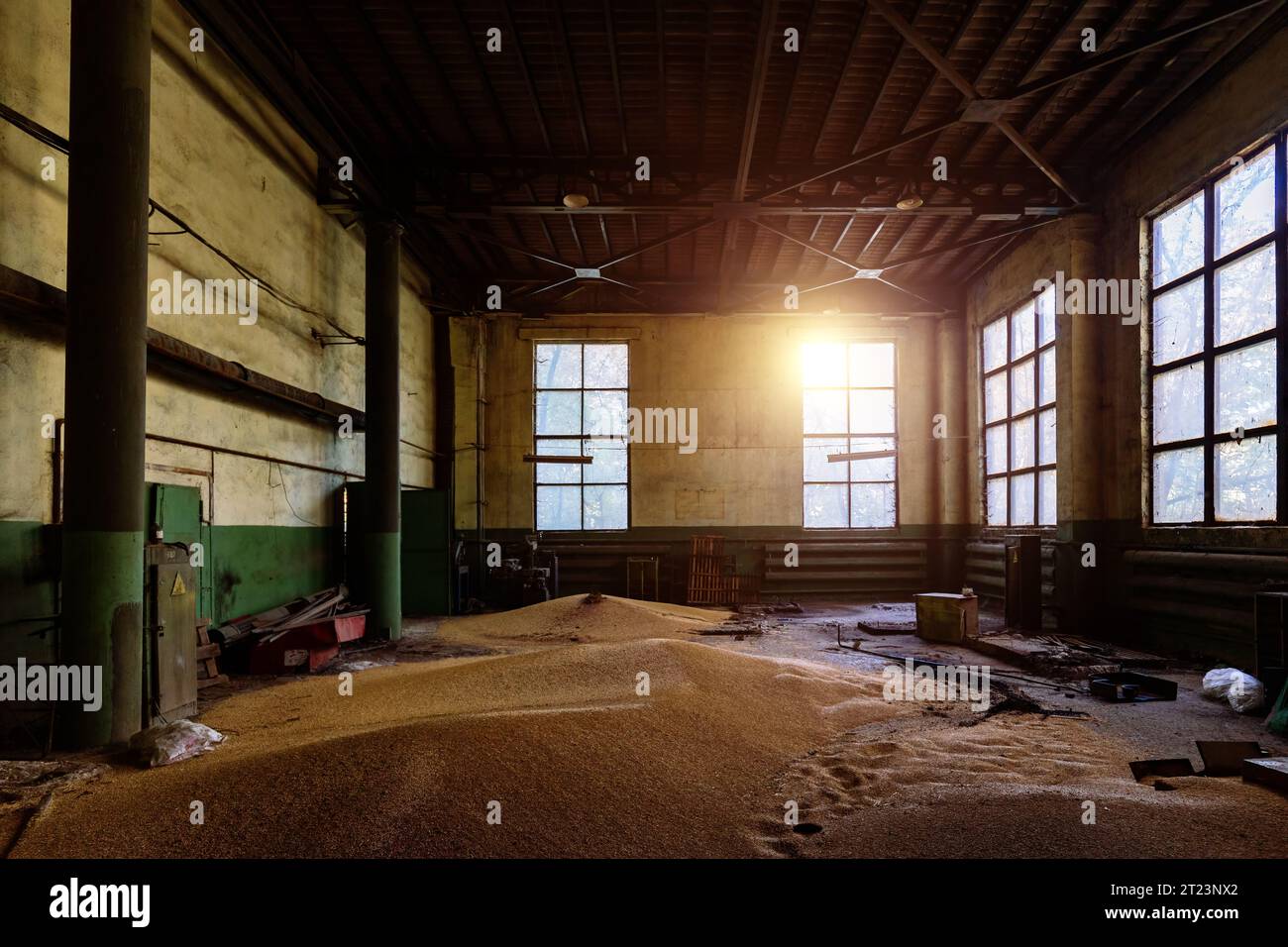 Old wheat grain storage in the hangar Stock Photo - Alamy