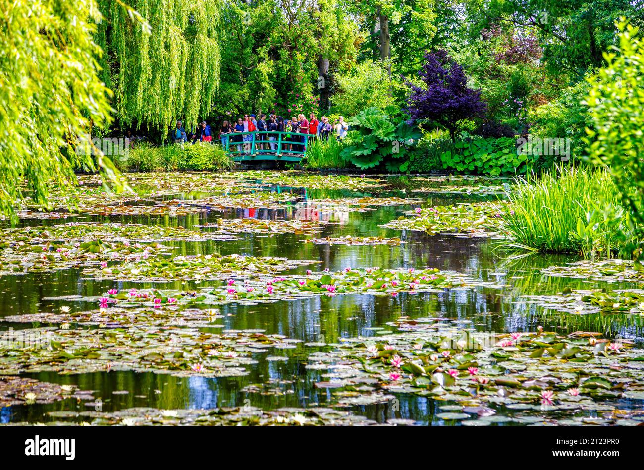 The iconic Water Lily Pond with water lilies and trees at Giverny, the ...