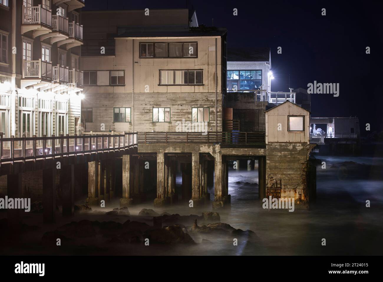 Night time view of the waterfront and skyline of downtown Monterey ...