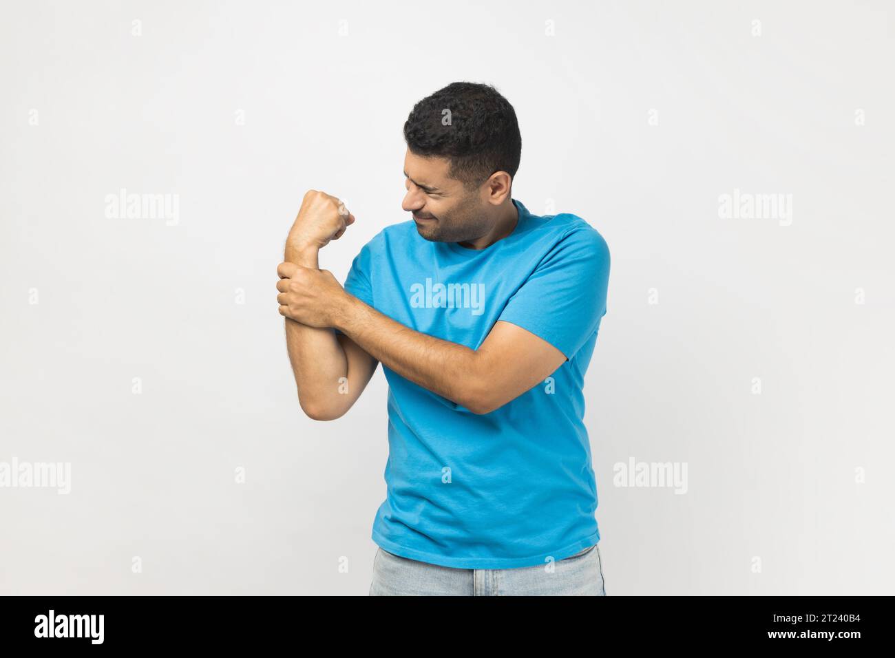 Portrait of unhealthy sick injured unshaven man wearing blue T- shirt ...