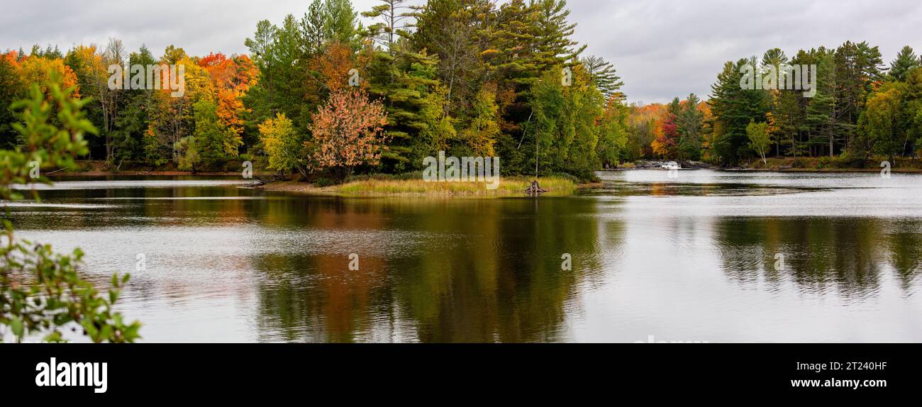 Waterfalls flowing into Lake of the Falls in Mercer, Wisconsin in ...