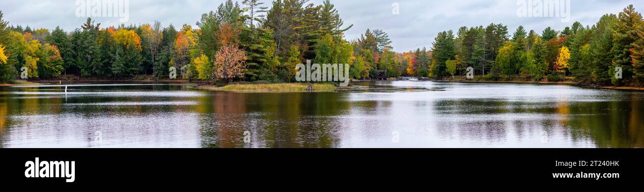 Waterfalls flowing into Lake of the Falls in Mercer, Wisconsin in ...