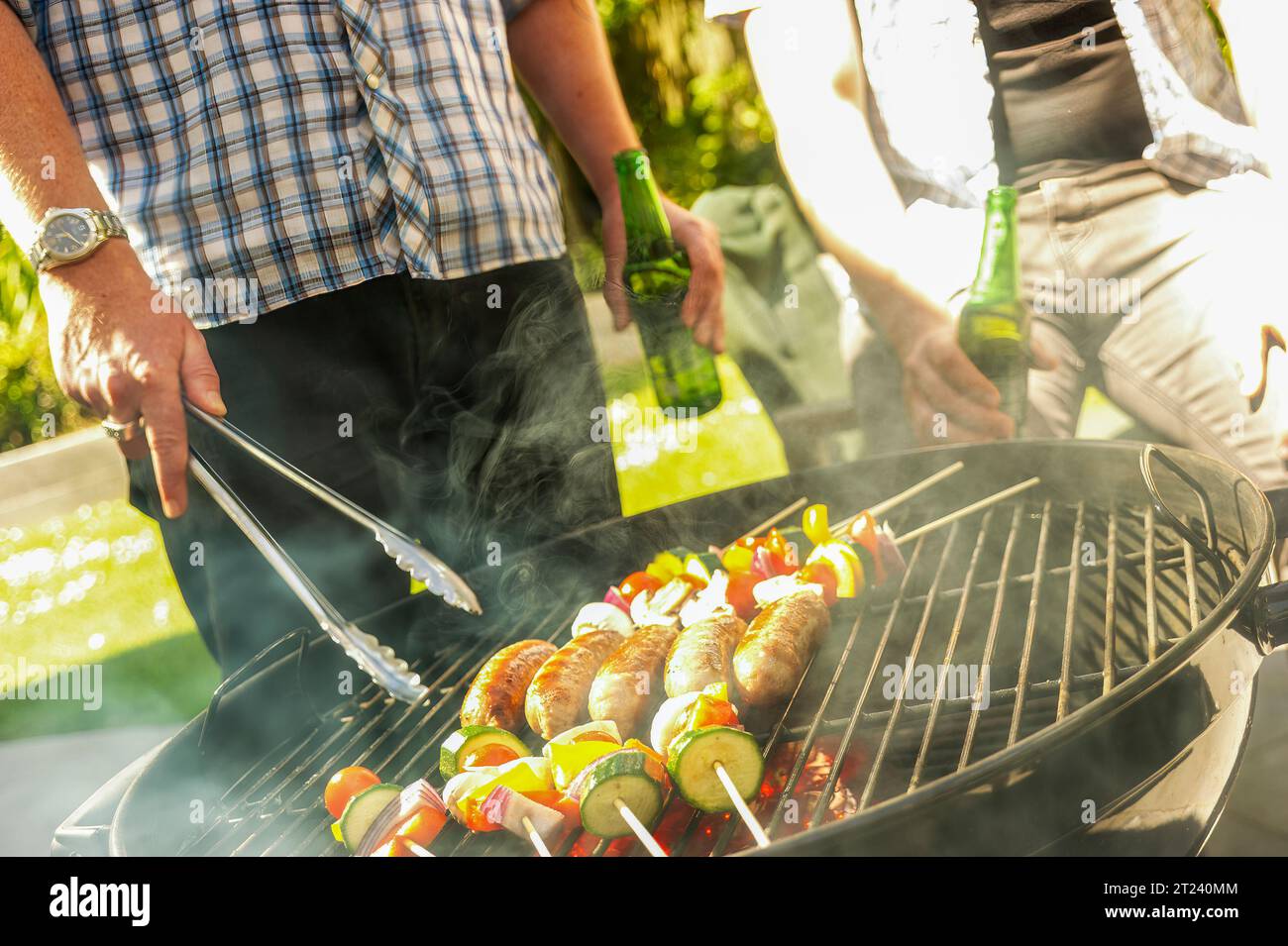 Two people meeting bbq hi-res stock photography and images - Alamy
