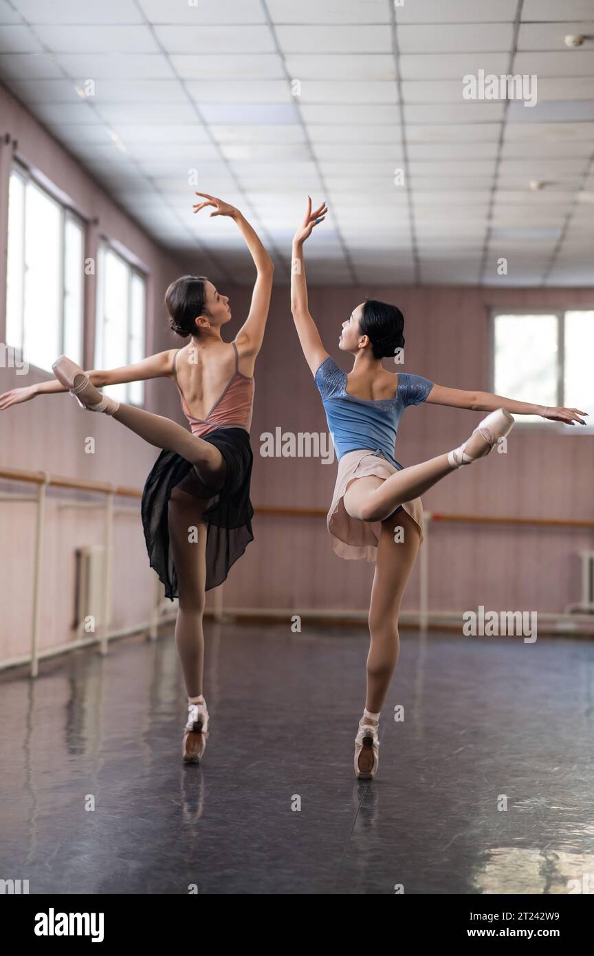 Two Asian ballerinas are dancing in the class Stock Photo - Alamy