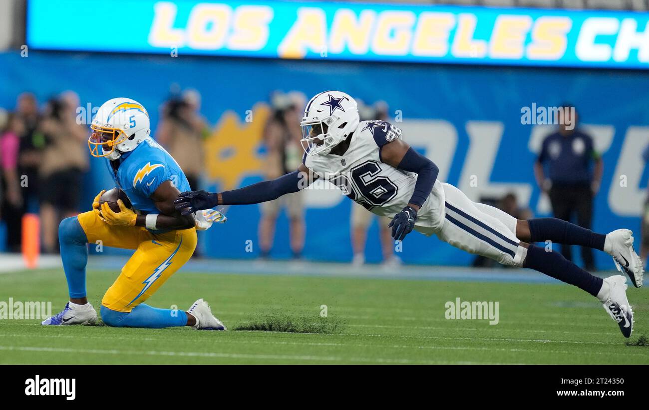 Los Angeles Chargers wide receiver Joshua Palmer (5) evades a tackle by ...