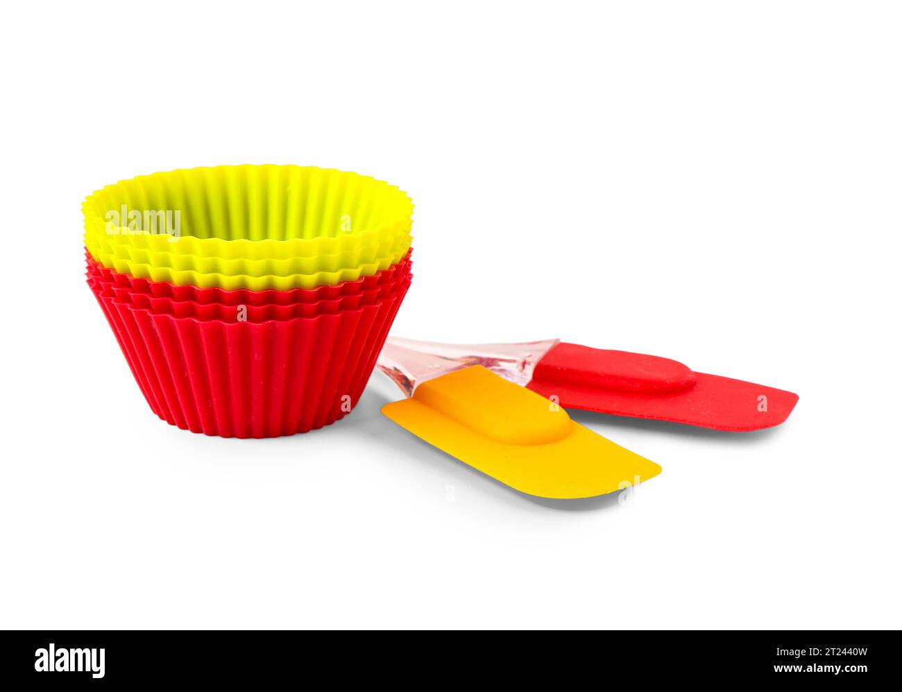 Baking forms and spatulas isolated on white background Stock Photo - Alamy