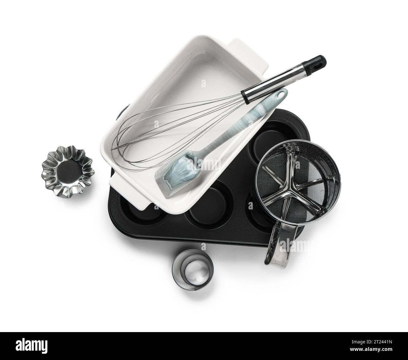 Baking forms and utensils isolated on white background Stock Photo - Alamy
