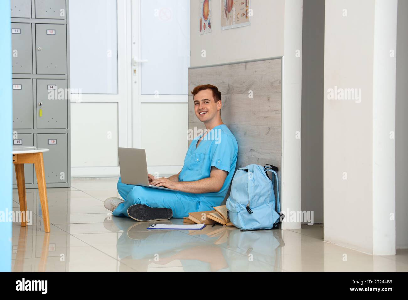 Male medical student studying with laptop at university Stock Photo - Alamy